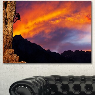 Designart "Climber on Sunset Background" Extra Large Landscape Canvas ...