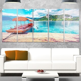 Designart 'Boat in Lake Bled In Julian Alps' Large Landscape Art Glossy ...