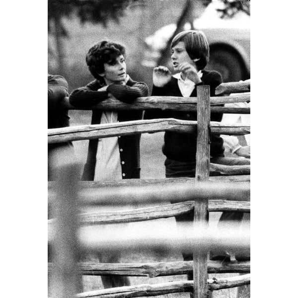 Audrey Hepburn and son Sean Ferrer leaning on a fence at a ranch Photo ...