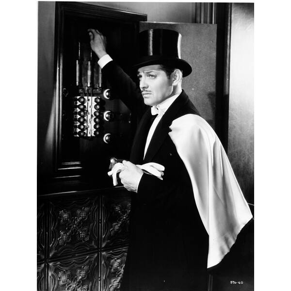 A film still of Clark Gable wearing a top hat and a cape Photo Print ...