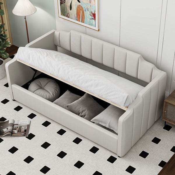 bed with a sofa underneath