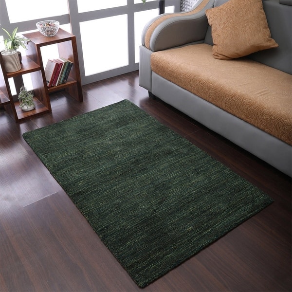 solid dark green area rug