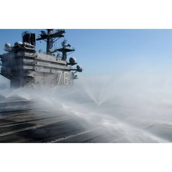 Sprinklers Spray The Flight Deck Of The Uss Ronald Reagan After ...