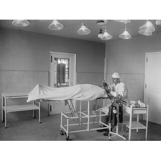 Anesthesiologist Administers Ether And Nitrous Oxide To Patient Before ...