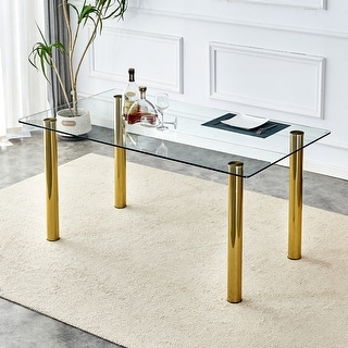 A modern minimalist style glass dining table. Transparent tempered ...