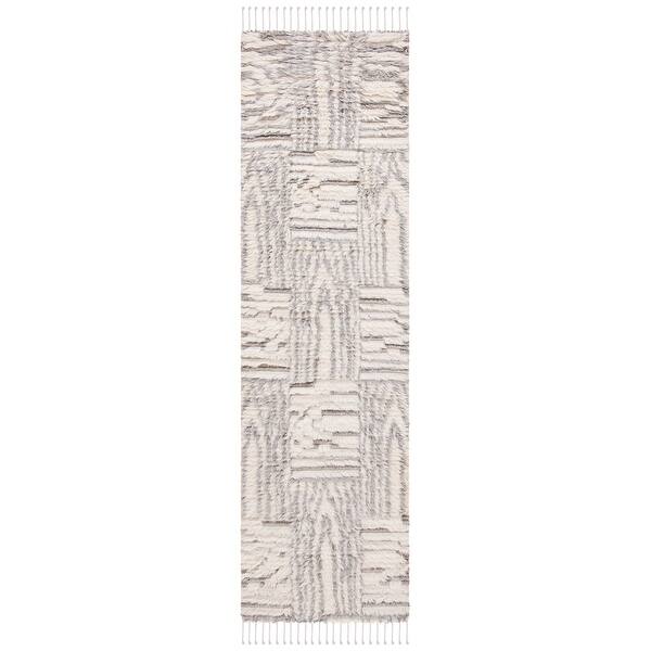 SAFAVIEH Hand-Knotted Manhattan Brith Wool Tassel Rug - On Sale - Bed ...