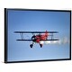 "Red 1943 Stearman bi-plane in flight with tail smoke, St. Francis ...