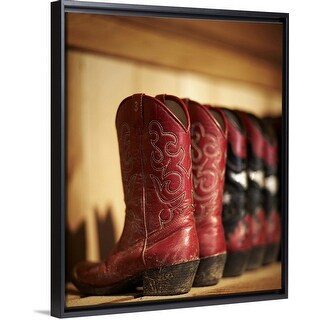 "Row of cowboy boots sitting on a shelf" Black Float Frame Canvas Art ...
