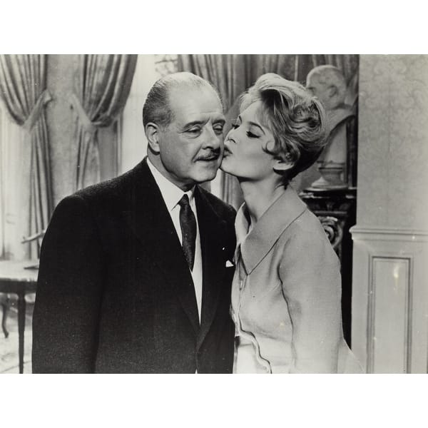 Film still featuring Brigitte Bardot and Andre Luguet in La Parisienne ...