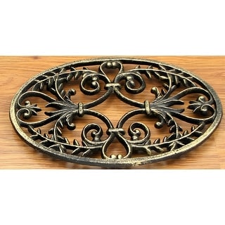 Bronze Cast Iron Oval Trivet with Ornate Detailing and Gold Accents ...