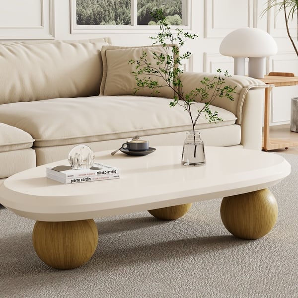 51" Modern Wood Coffee Table with 3 ball legs - On Sale - Bed Bath ...