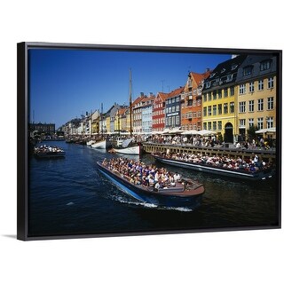 "High angle view of tourists on a boat in a river, Nyhavn, Copenhagen ...
