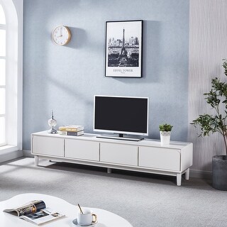 White TV Stand with Four Storage Drawers - Bed Bath & Beyond - 37593551