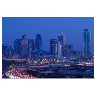 "High angle view of a multiple lane highway in front of a city ...
