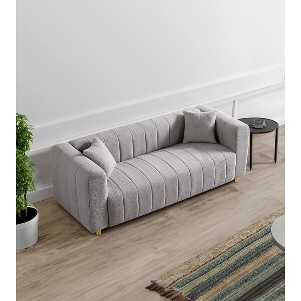 grey material sofas