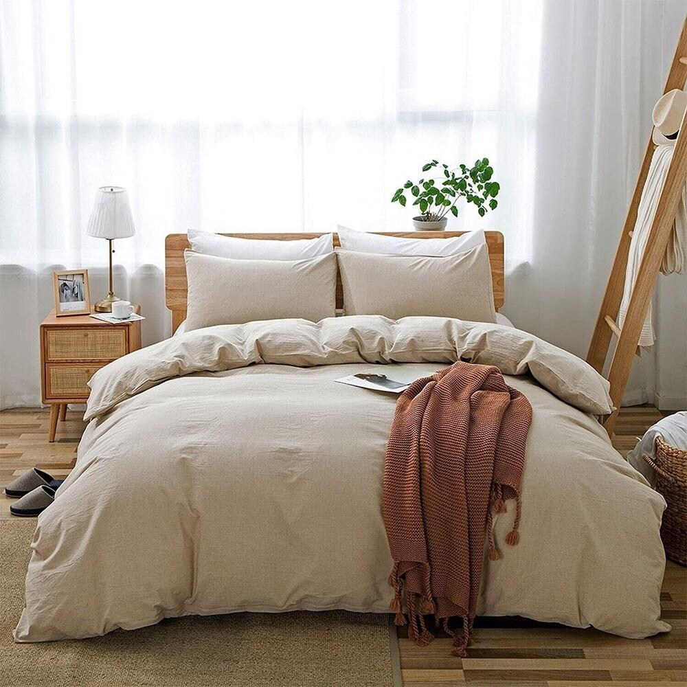 beige textured bed sheets