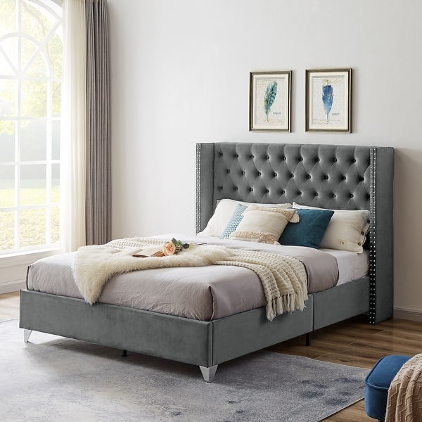 grey tufted platform bed