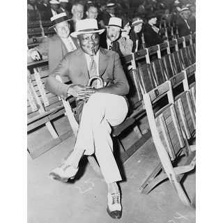 Jack Johnson Smoking A Cigar And A Holding Cane While Watching Baer ...