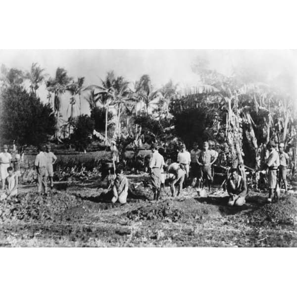 Three Men Kneel Before Their Open Graves On Guam In 1941 Behind Them ...