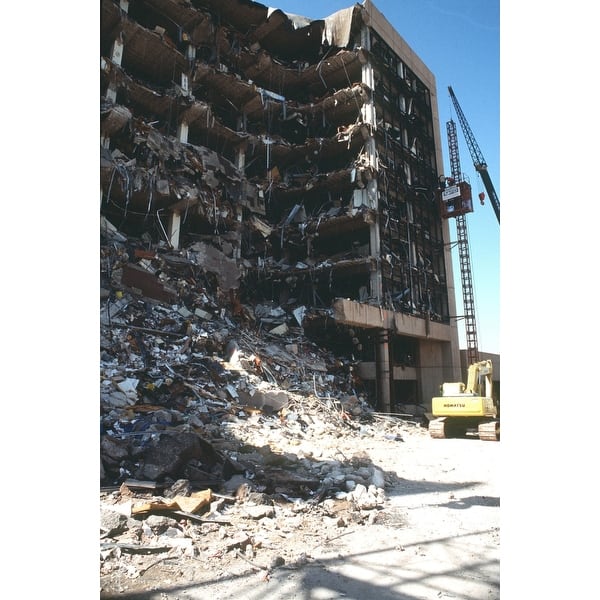 Construction Workers Erect An External Elevator On The Ruins After The ...