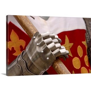 "Close-up of articulated hand of armor gripping weapon" Canvas Wall Art ...