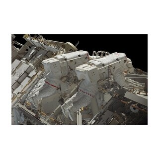 Astronauts participate in a spacewalk Photography Art Print/Poster ...