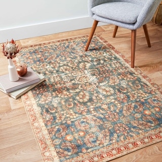 Alexander Home Dhanya Distressed Border Area Rug - Bed Bath & Beyond ...