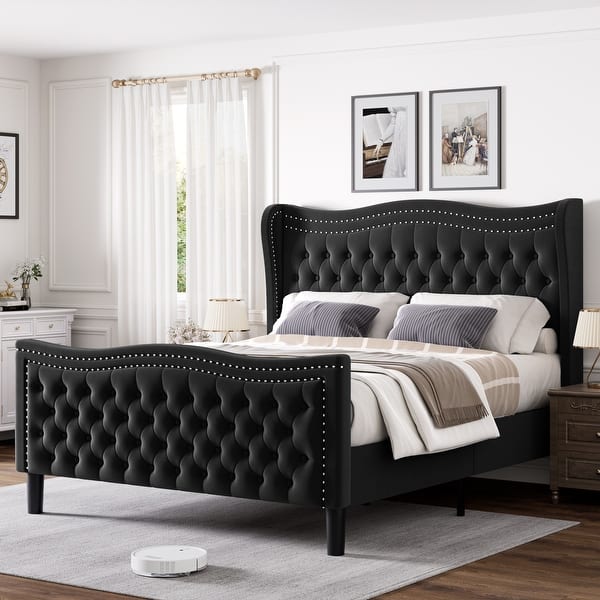 black tufted platform bed