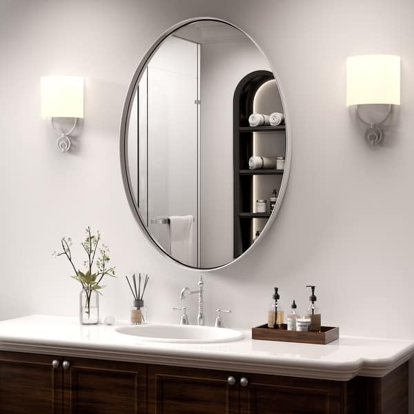 white oval mirrors