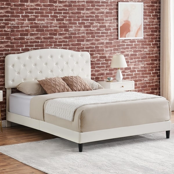 tufted leather platform bed