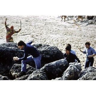 Film still featuring The Beatles running on a beach in Help Photo Print ...