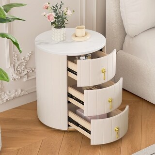 Round upholstered bedside table with 3 drawers and metal handles, all assembled except for the ...