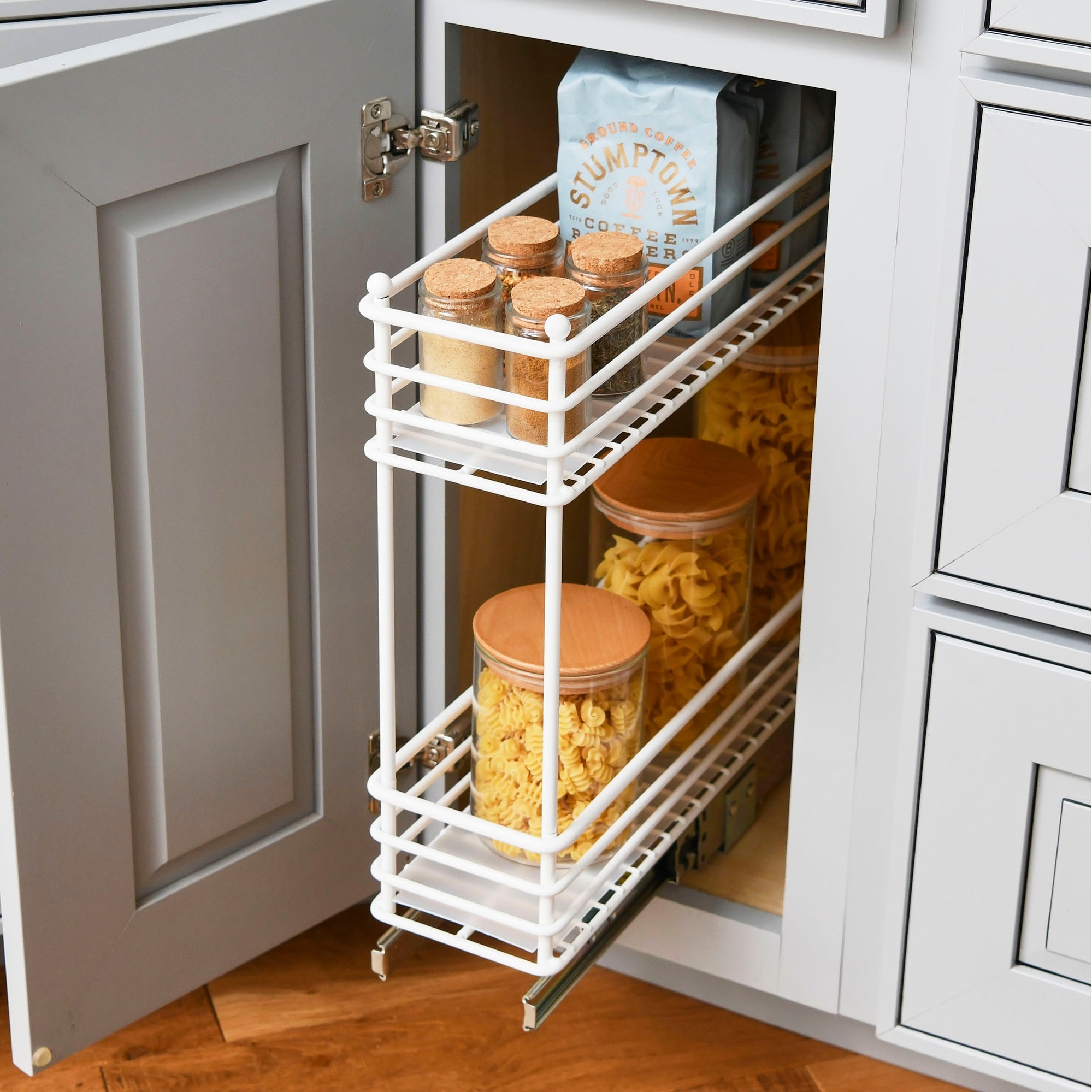 Narrow kitchen cupboard store