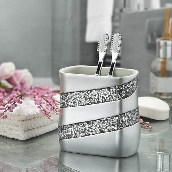 silver toothbrush holder