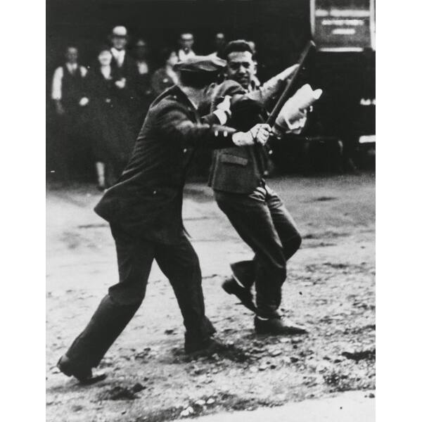 A Striker Dodges PolicemanS Night Stick During San Francisco General ...