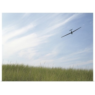 "Glider flying in sky with grass in foreground" Poster Print - Multi ...