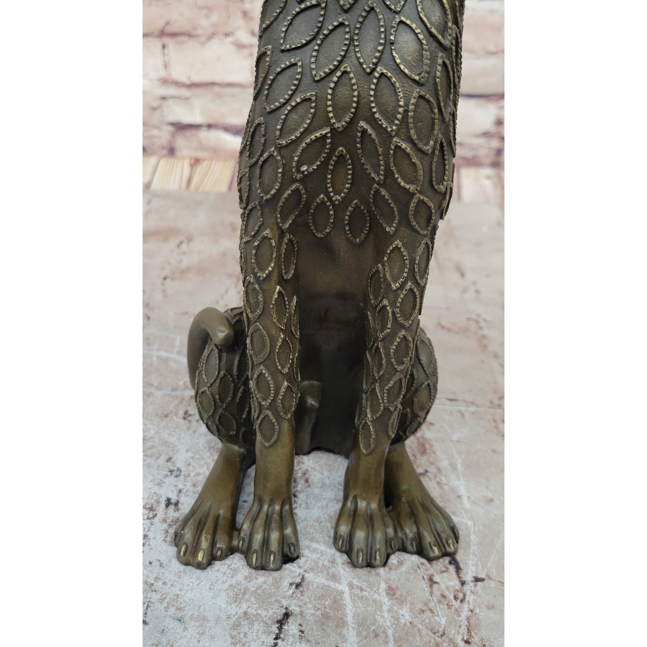 roaring leopard statue