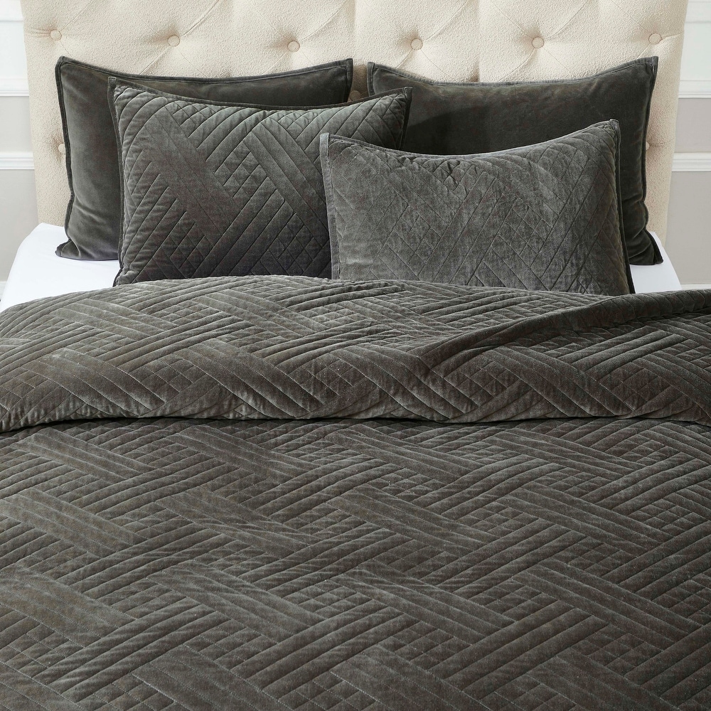dark gray patterned quilt