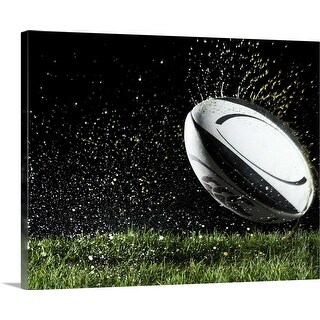 "Rugby ball in motion over grass" Canvas Wall Art - Bed Bath & Beyond ...