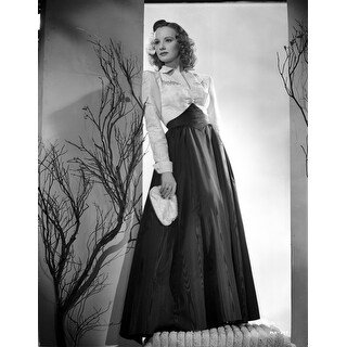 Martha Holliday on a Silk Long Sleeve Dress and Leaning on Wall ...