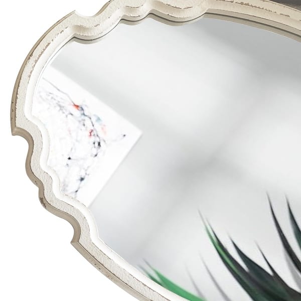 white oval mirrors