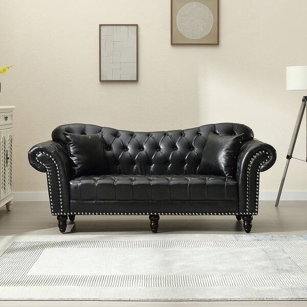 camel back sofa leather