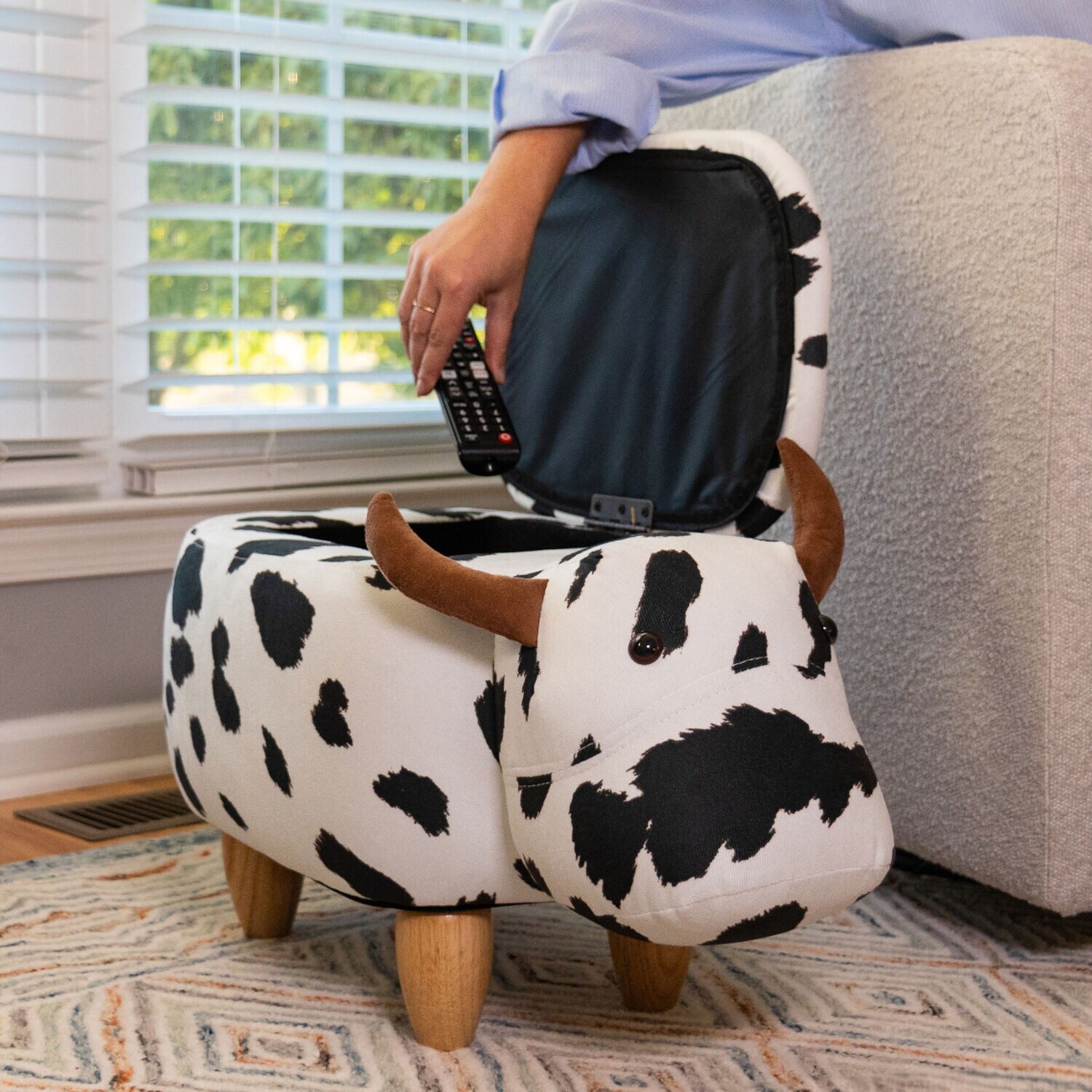 Black and white cow ottoman store