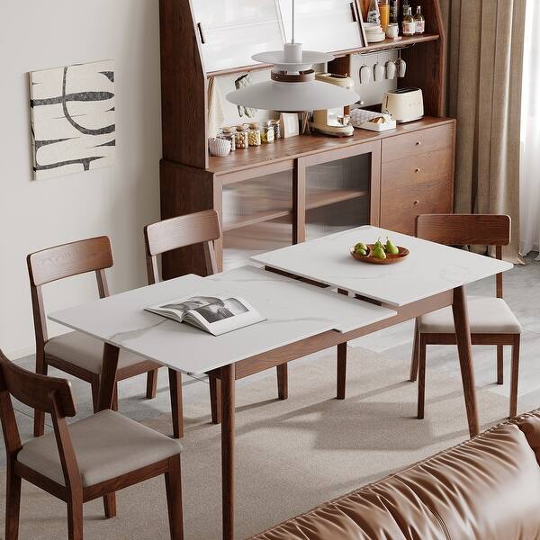 White slate retractable table with rounded corners and slanted legs ...