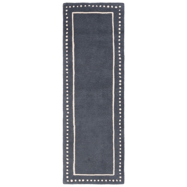 blue dot border rug