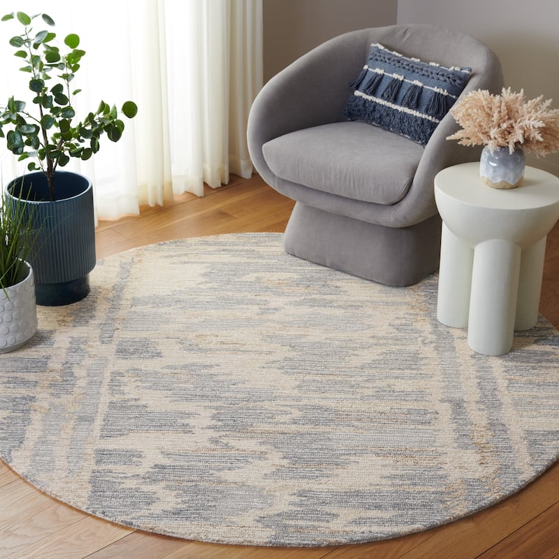 SAFAVIEH Handmade Ebony Irmgardt Modern Wool Rug - Overstock - 40451489