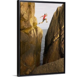 "Man leaping over rocky crevice" Black Float Frame Canvas Art - Bed ...