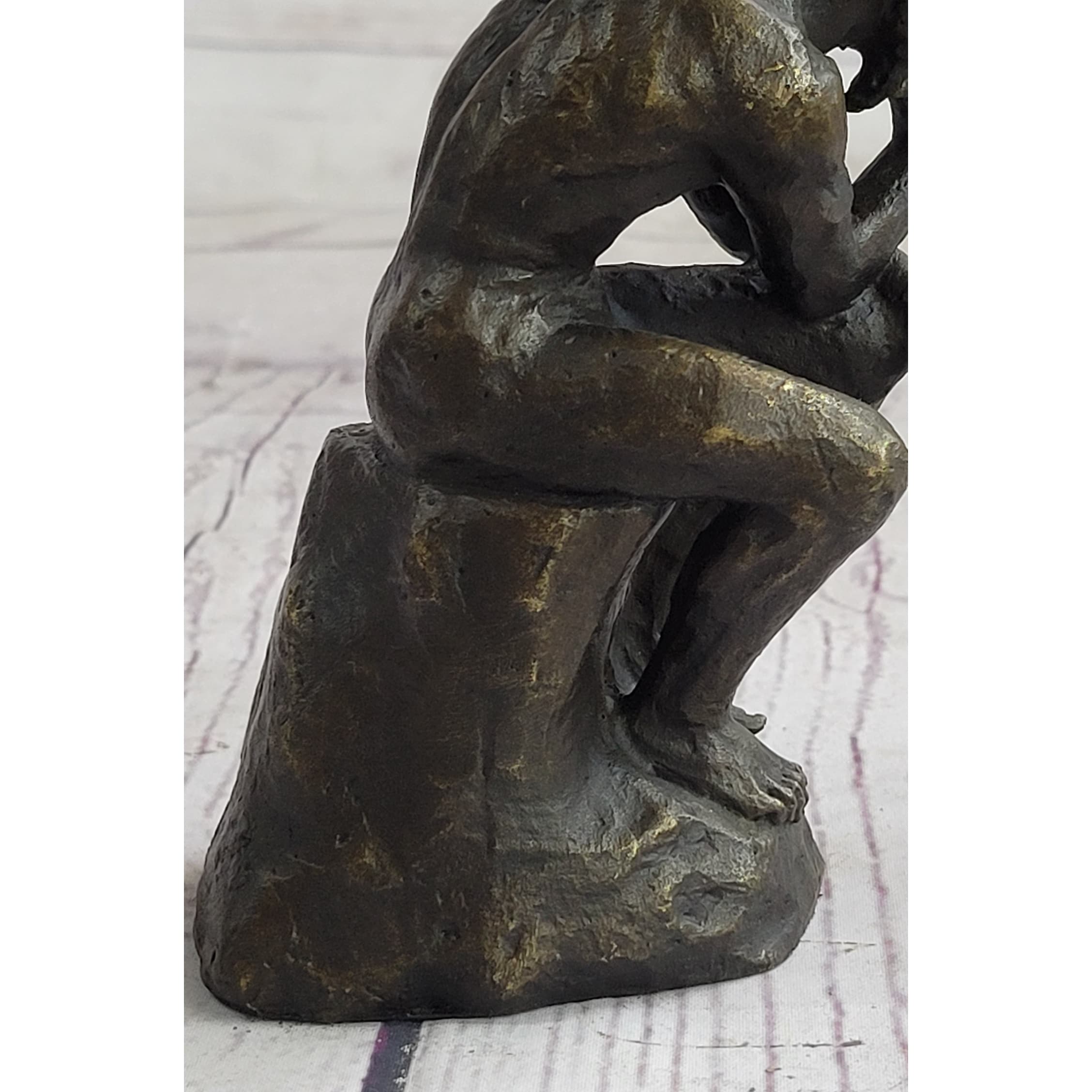 thinking figure statue