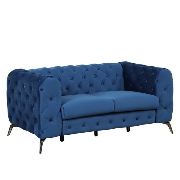 blue button back sofa