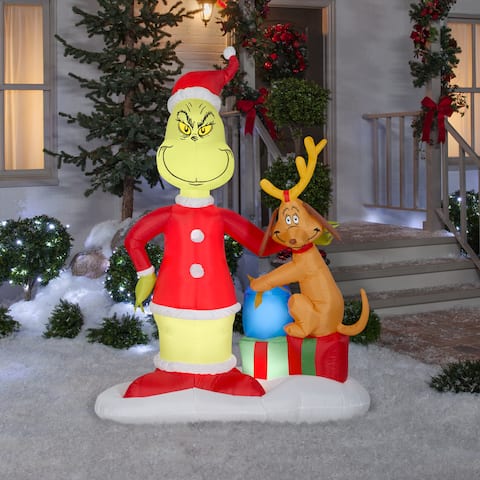 Gemmy Christmas Airblown Inflatable Grinch Hanging from Wreath Dr ...